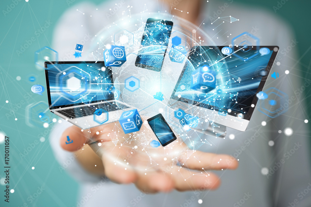 Tech devices connected to each other by businesswoman 3D rendering ...