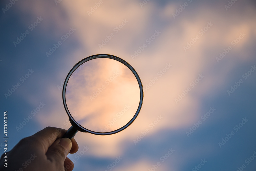 Magnifying glass scan clound on sky Stock Photo | Adobe Stock