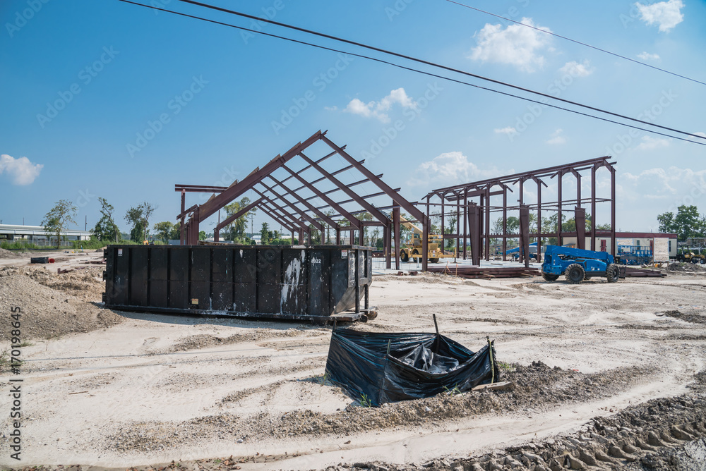 Steel structure of new industrial building under cloud blue sky. New ...