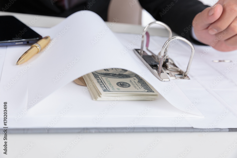 Businessman receive money in the envelope offered in file - anti ...