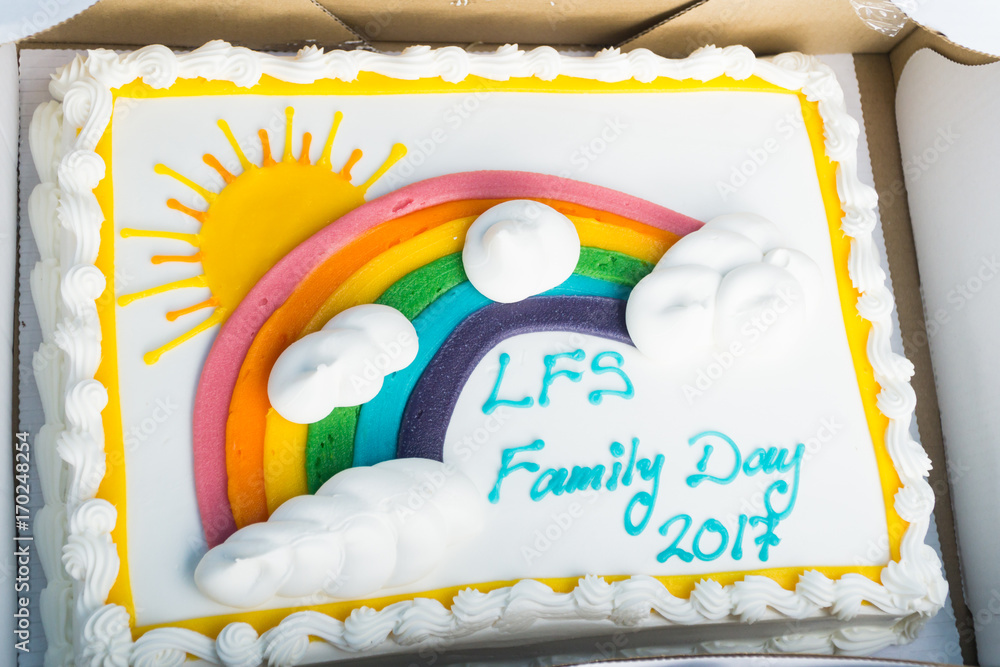 Birthday cake with white icing Stock Photo | Adobe Stock