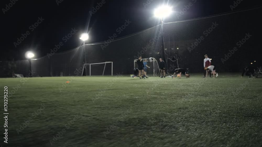 Soccer football players during the team training before the match ...