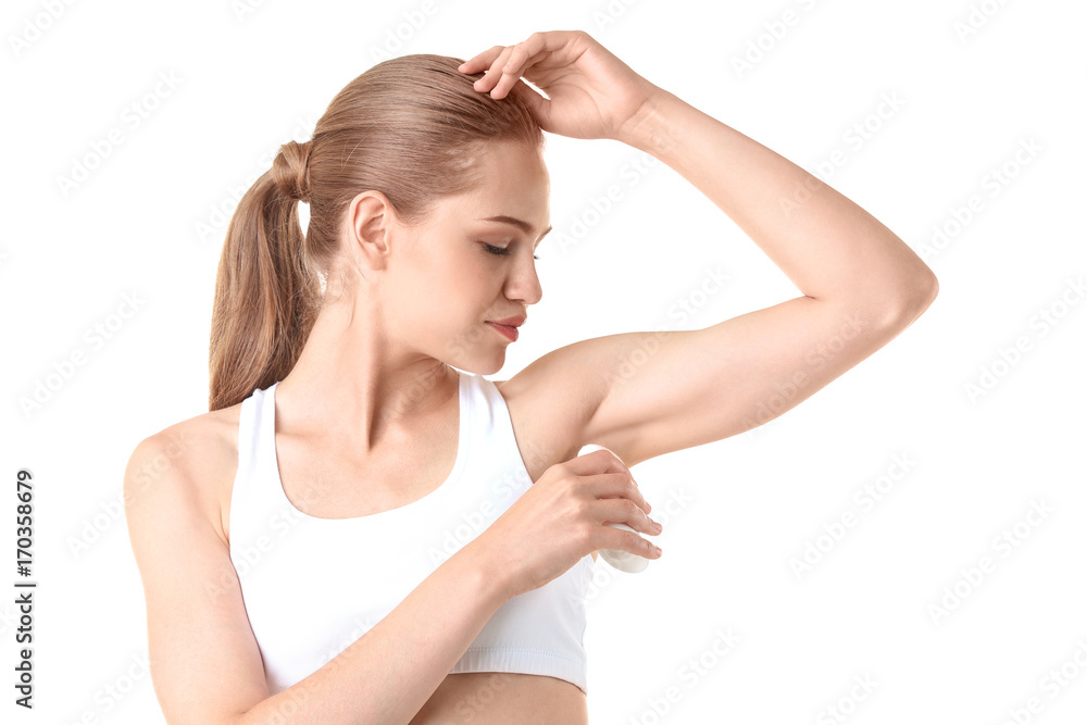 Beautiful young woman with deodorant on white background Stock Photo ...