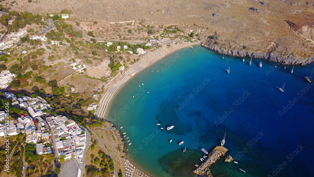Aerial drone photo of famous beach of Lindos with turquoise waters and ...