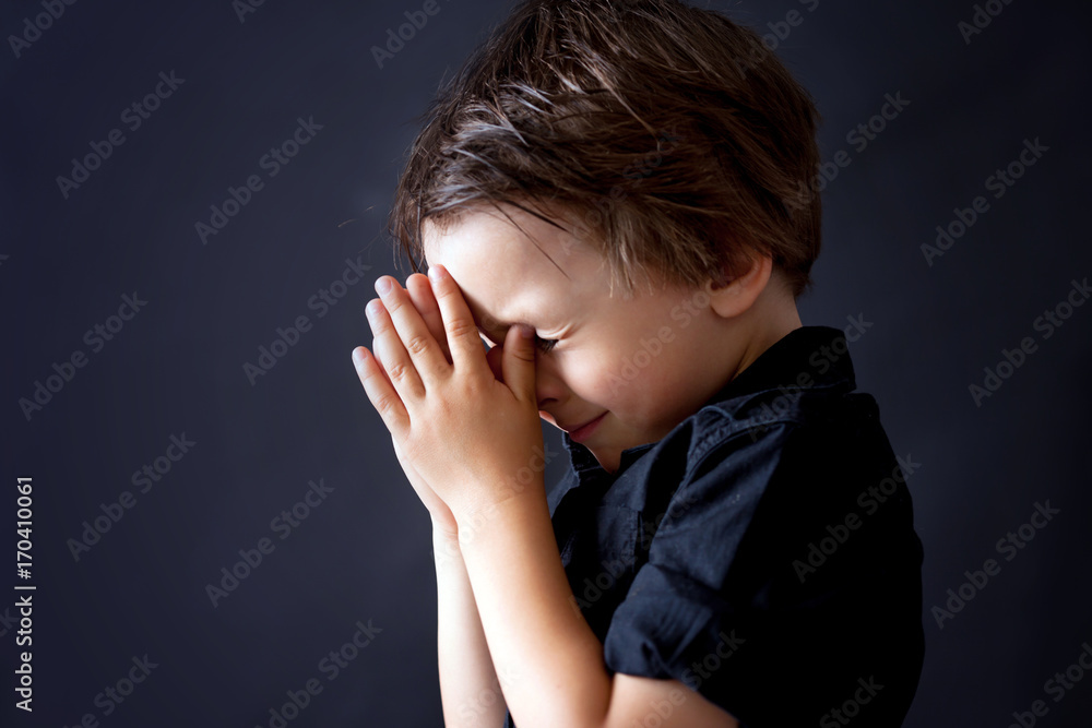 Little boy praying, child praying, isolated background Stock Photo ...