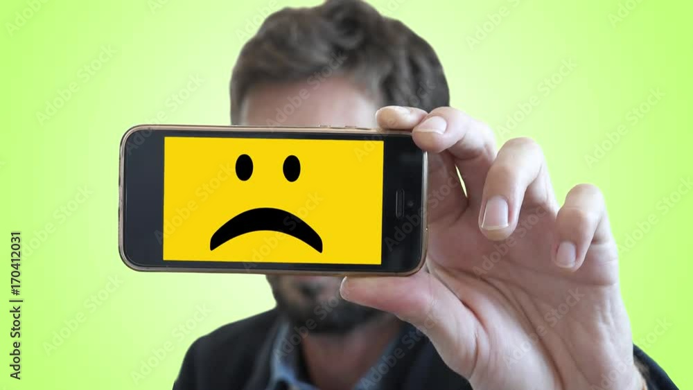 Sad Smartphone In Man Hands. Man shows his feelings through a ...