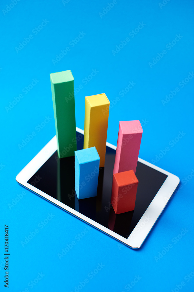 Charts made of colourful paper presenting diagram concept in real life ...