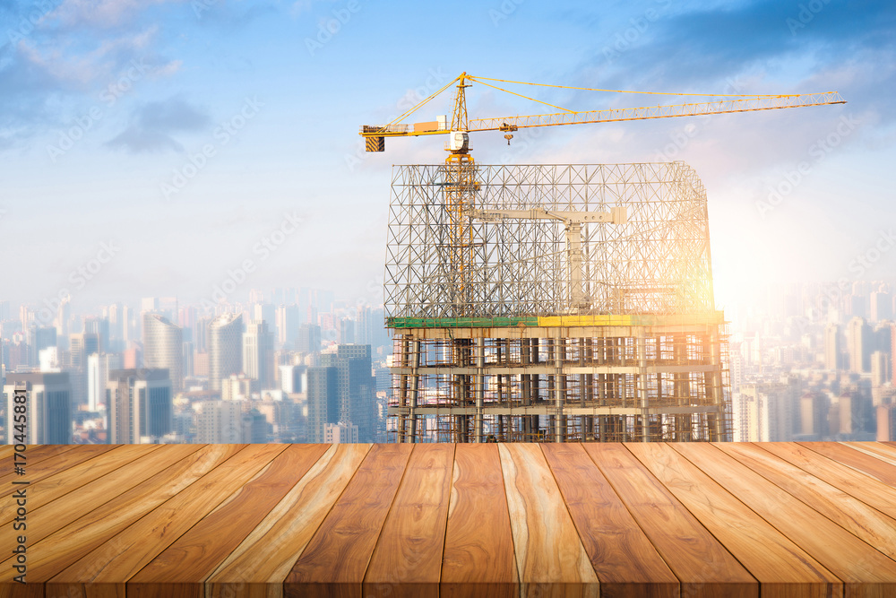 Building of a skyscraper with two tower cranes Stock Photo | Adobe Stock