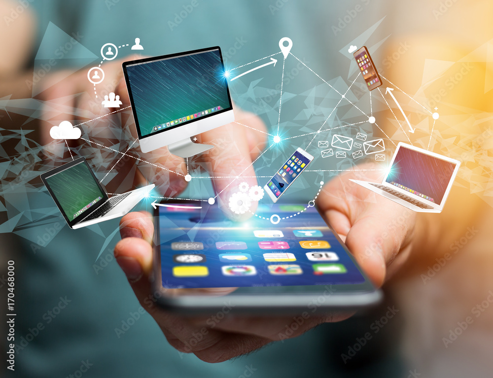 Computer and devices displayed on a futuristic interface with ...