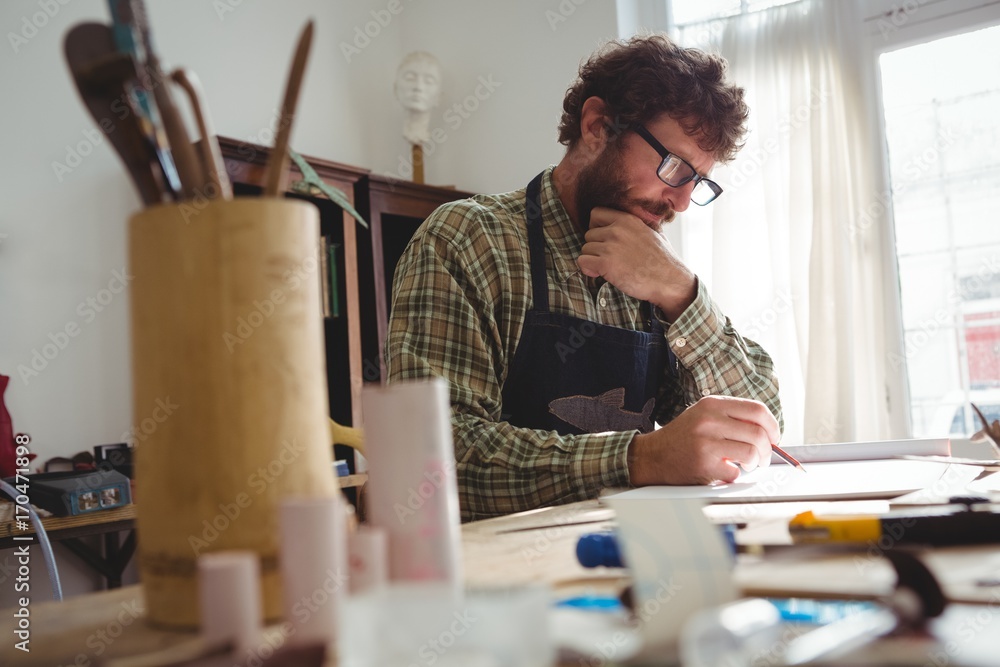 Craftsman drawing sculpture design Stock Photo | Adobe Stock