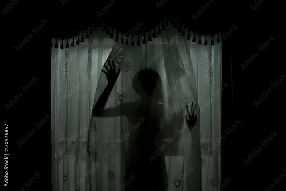 Scary human body silhouette woman front of window behind the black ...