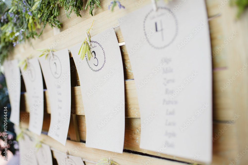 Papers with names of guests Stock Photo | Adobe Stock