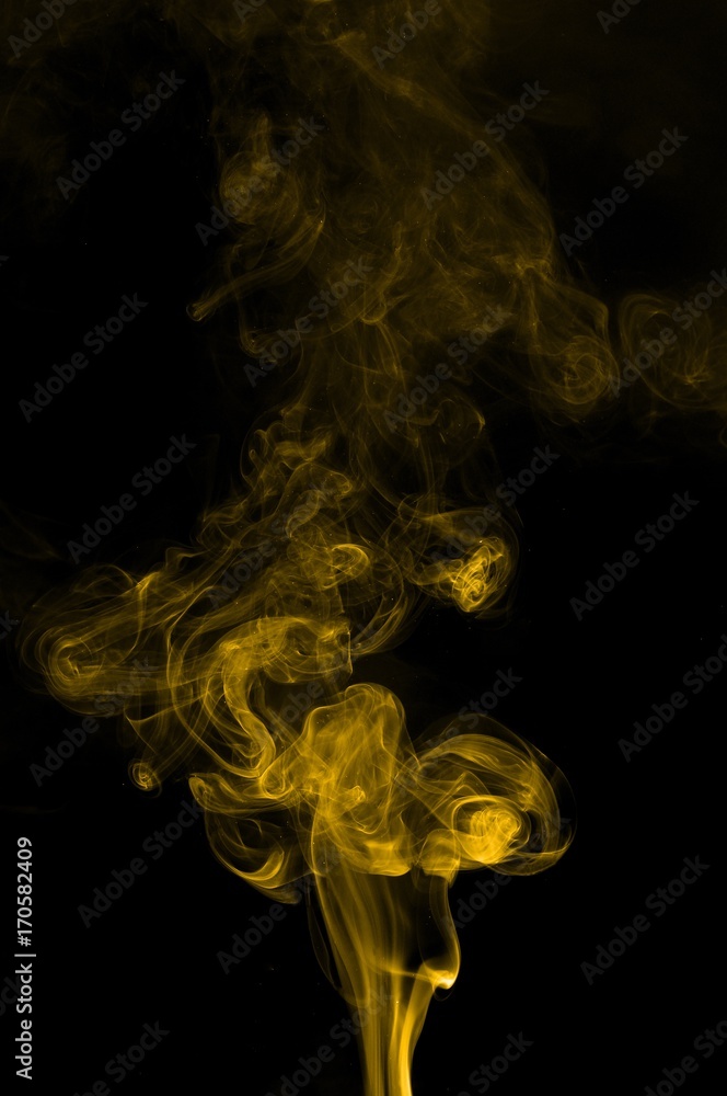 Gold smoke on black background,movement of gold smoke, Abstract gold ...