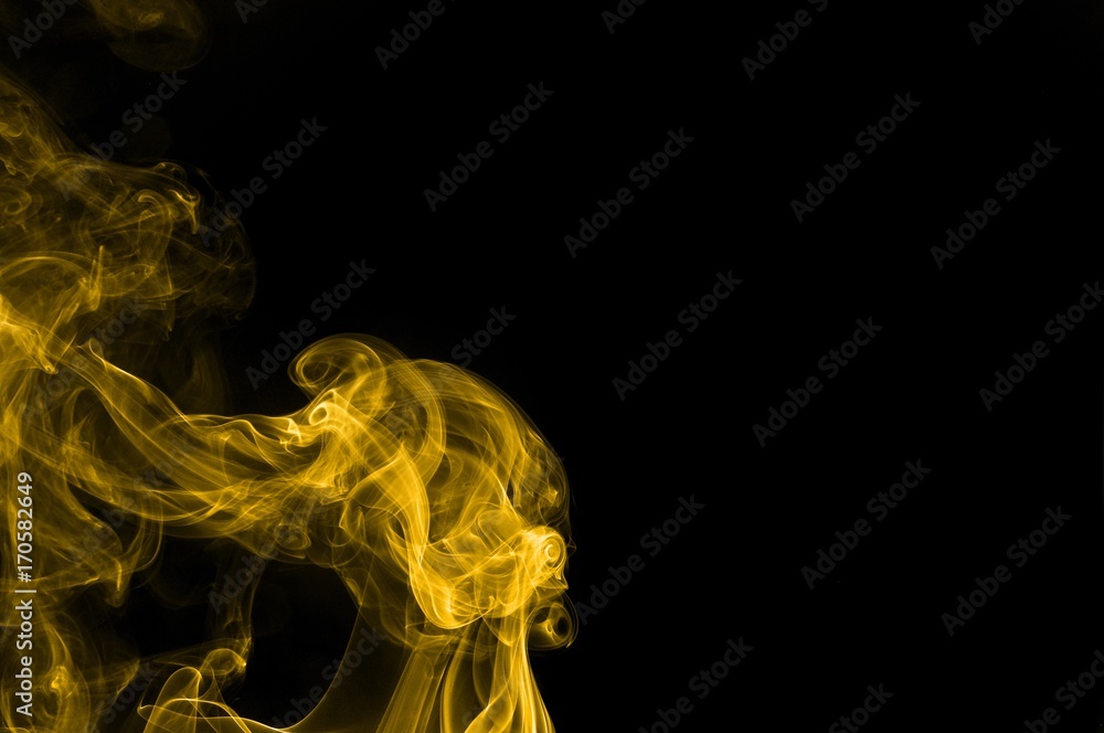 Gold smoke on black background,movement of gold smoke, Abstract gold ...