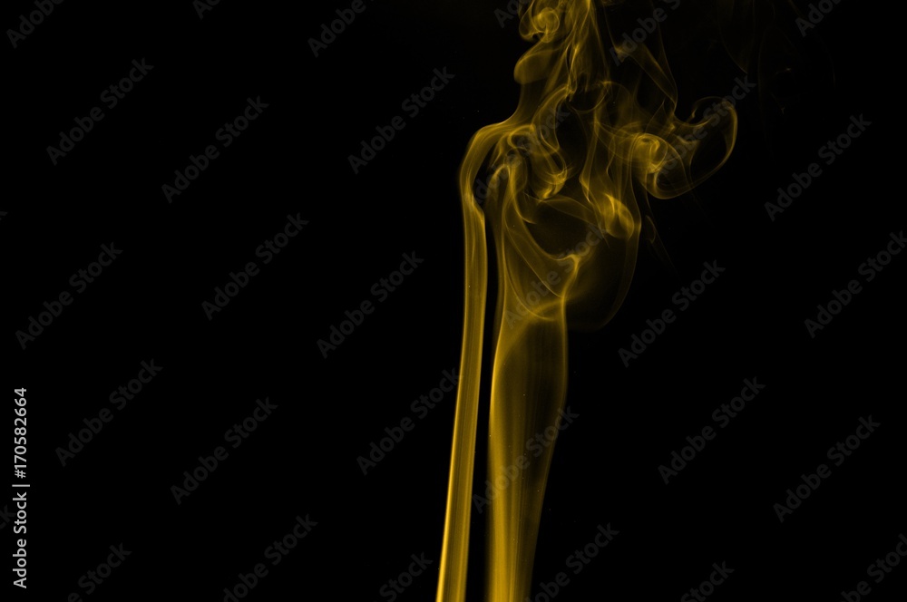 Gold smoke on black background,movement of gold smoke, Abstract gold ...
