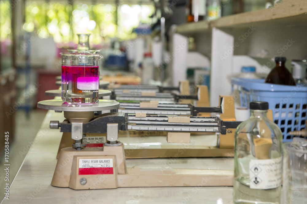Triple beam balance In the chemistry laboratory. Stock Photo | Adobe Stock