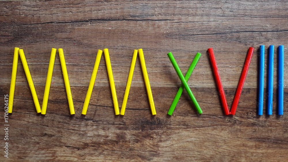 2018 Roman numerals on a wooden background | Uwalls.co.uk