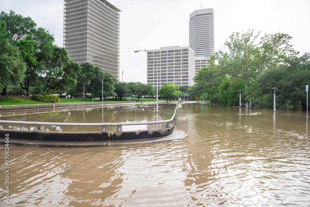 High and fast water rising in Bayou River from Montrose boulevard with ...