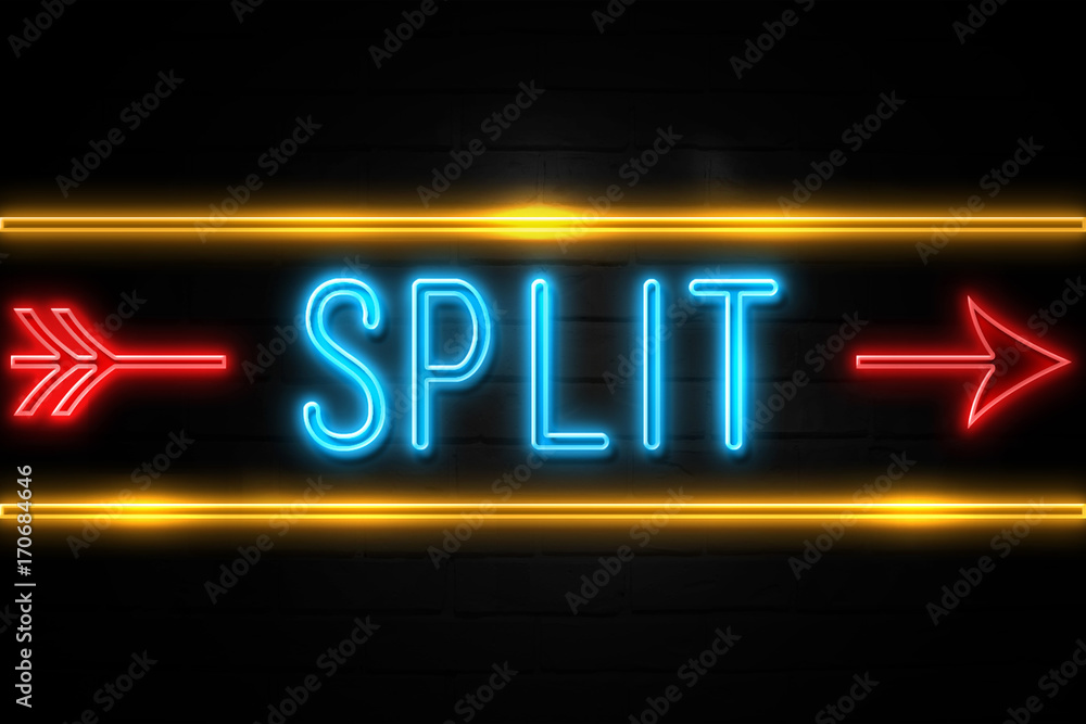 Split - fluorescent Neon Sign on brickwall Front view Stock ...