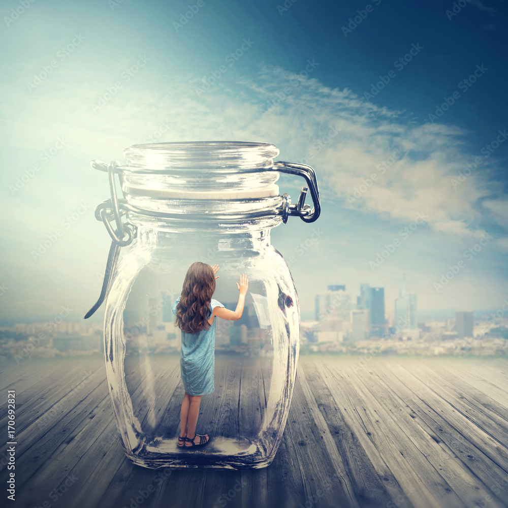 Young girl in a glass jar Stock Photo | Adobe Stock