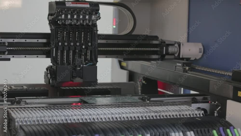 Automated Electronic circuit board line production. Machine Produces ... Automated Electronic circuit board line production. Machine Produces ...