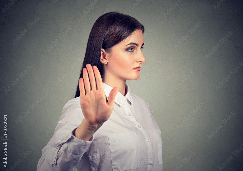 angry woman giving talk to hand gesture with palm outward Stock Photo ...