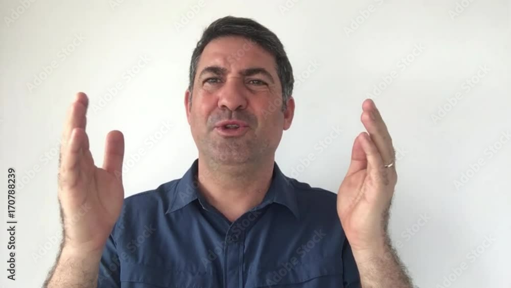 Italian man demonstrate I do not know sign of Italian hand gestures ...