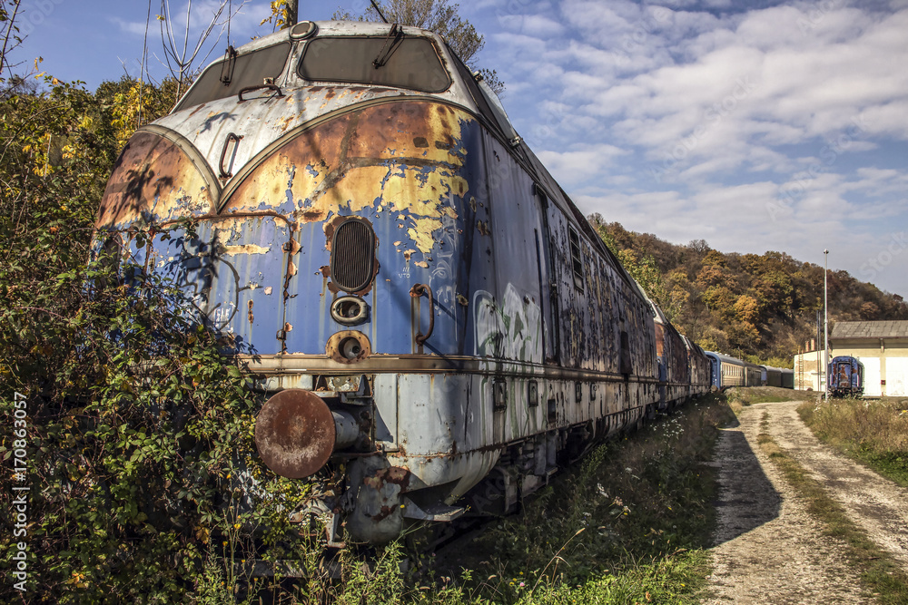 Rundown train on a dead-end railroad Stock Photo | Adobe Stock