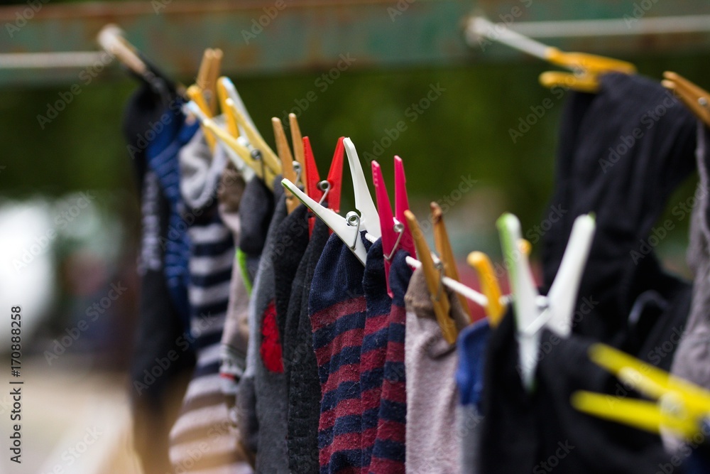 Washing line with socks and some underwear hung to dry Stock Photo ...