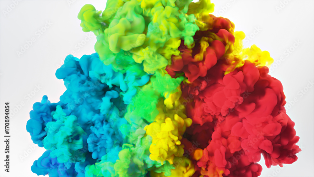 Colorful rainbow paint drops from above mixing in water. Ink swirling ...