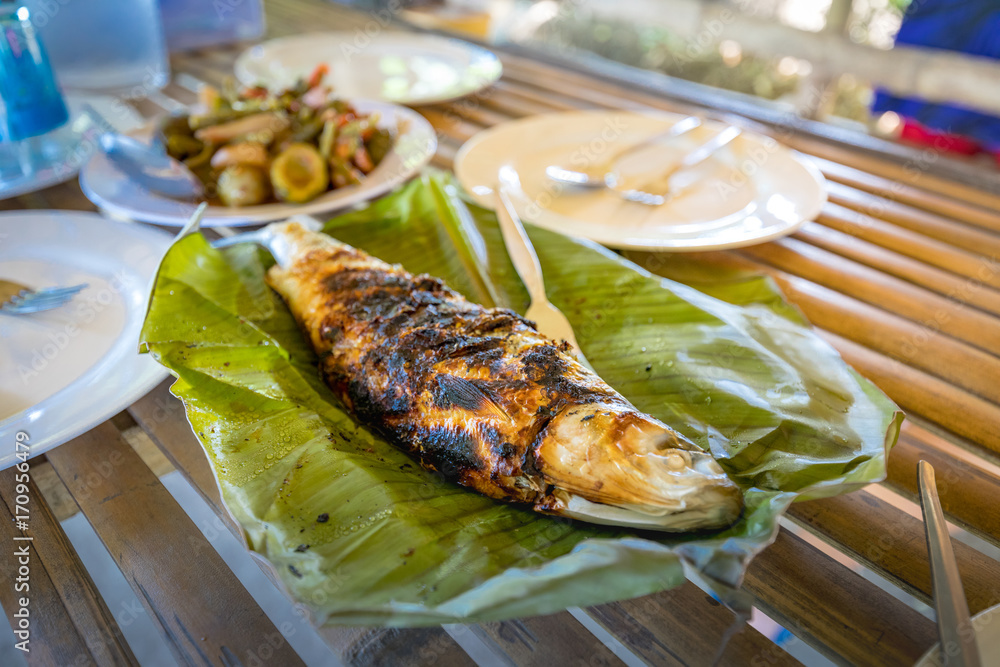 Filipino favorit fish grilled bangus - Milkfish Stock Photo | Adobe Stock