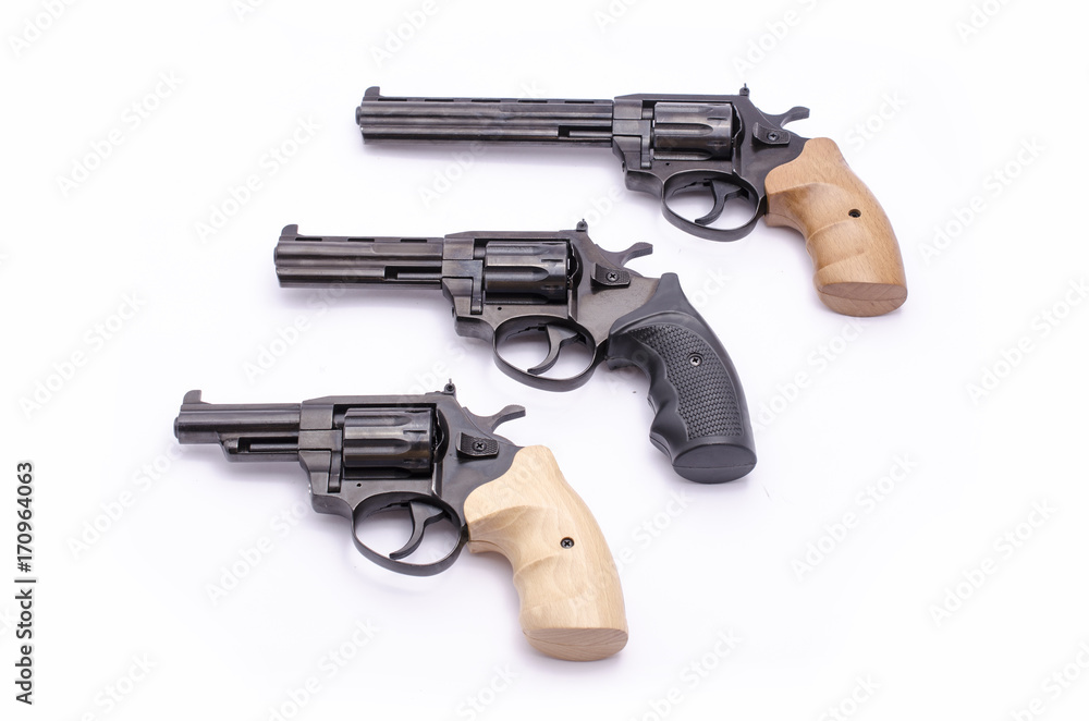 three revolvers with gun drums isolated on white Stock Photo | Adobe Stock