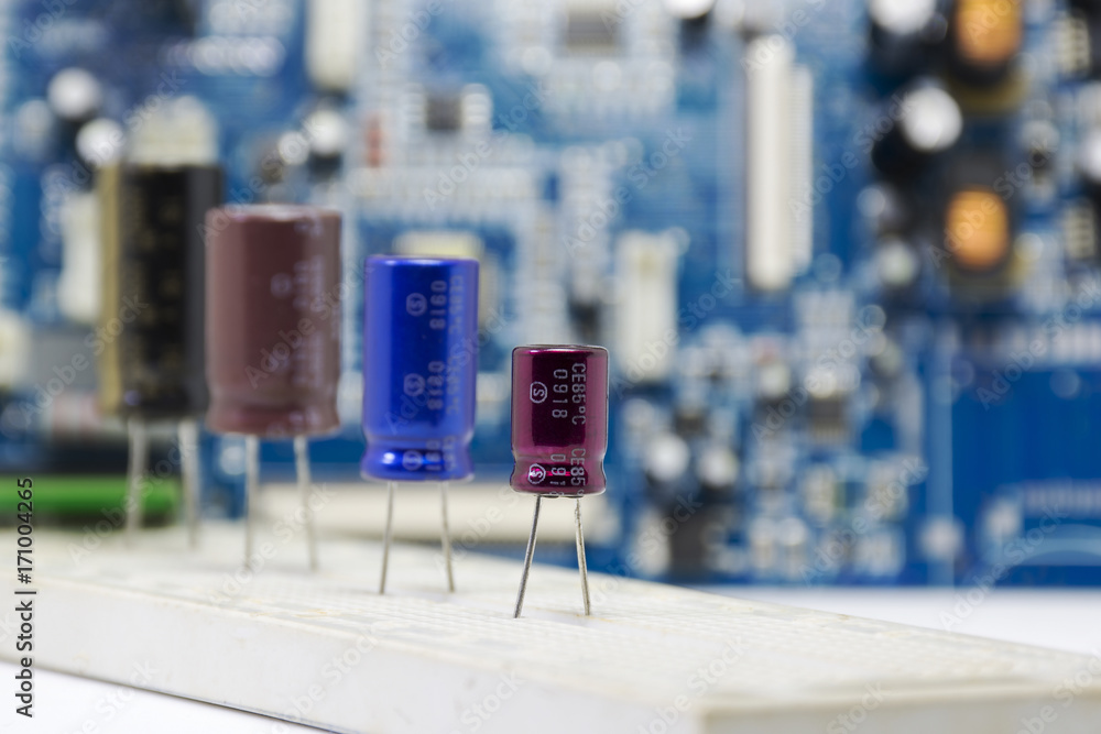 Electrolytic Capacitors, multi color and many sizes an installed in pcb ...