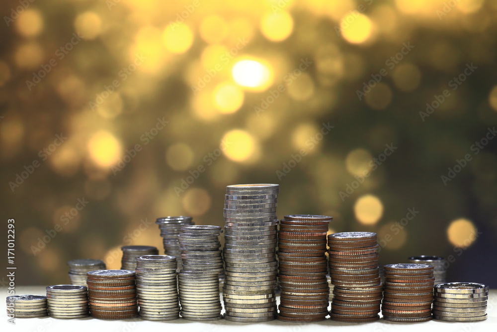 pyramid coin column stacking high, on gold light background. Saving and ...