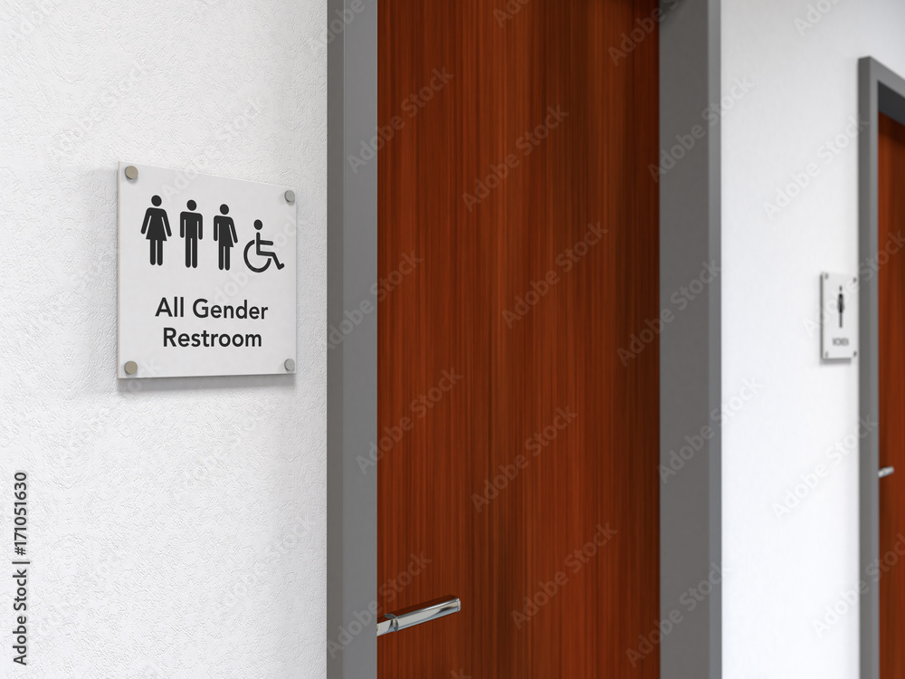 All-gender restroom signage next to a wooden restroom door Stock ...