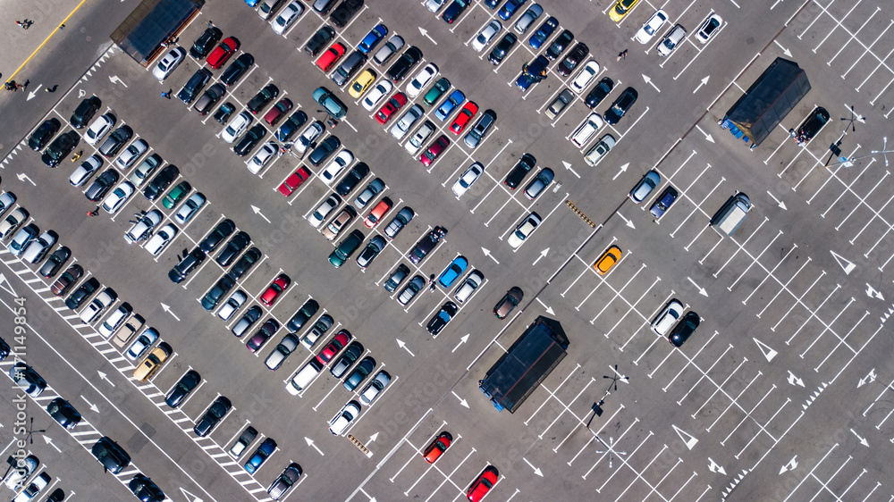 Aerial top view of parking lot with many cars from above ...