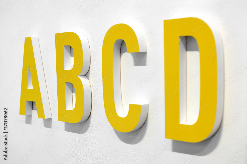 ABCD yellow alphabet letters Stock Photo | Adobe Stock