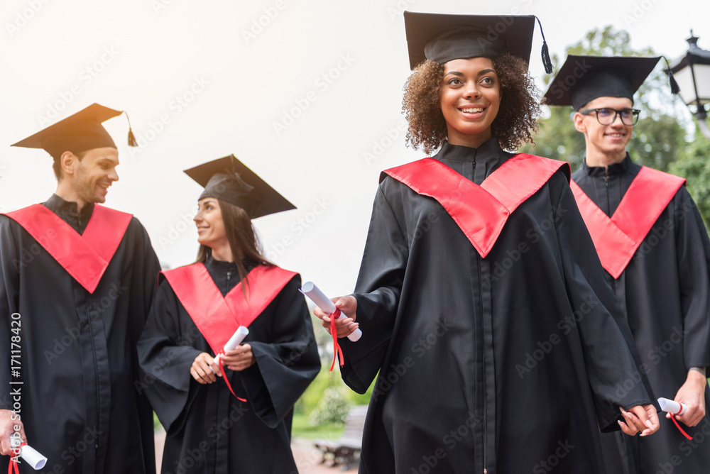 Joyful students celebrating their graduation from university Stock ...