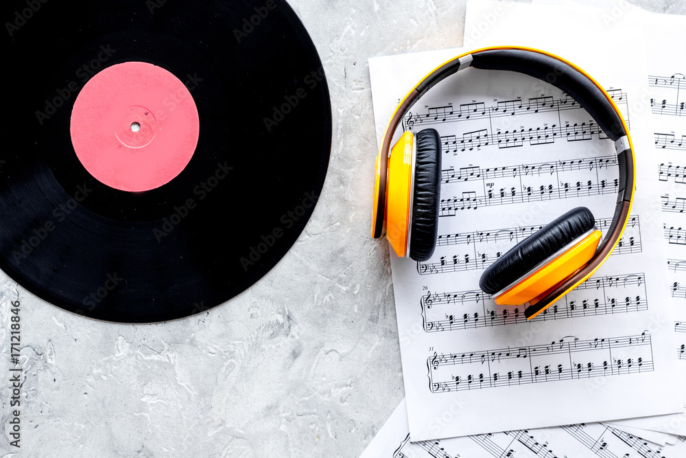 Desk of musician for songwriter work set with vynil record and notes ...