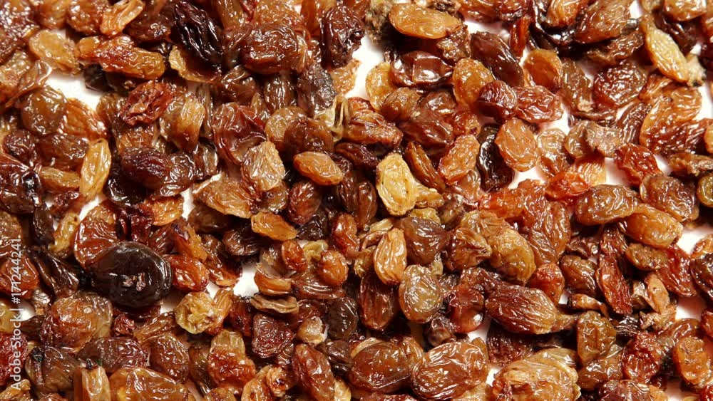 Raisin dried grape after washing are drying on paper tissue, background ...