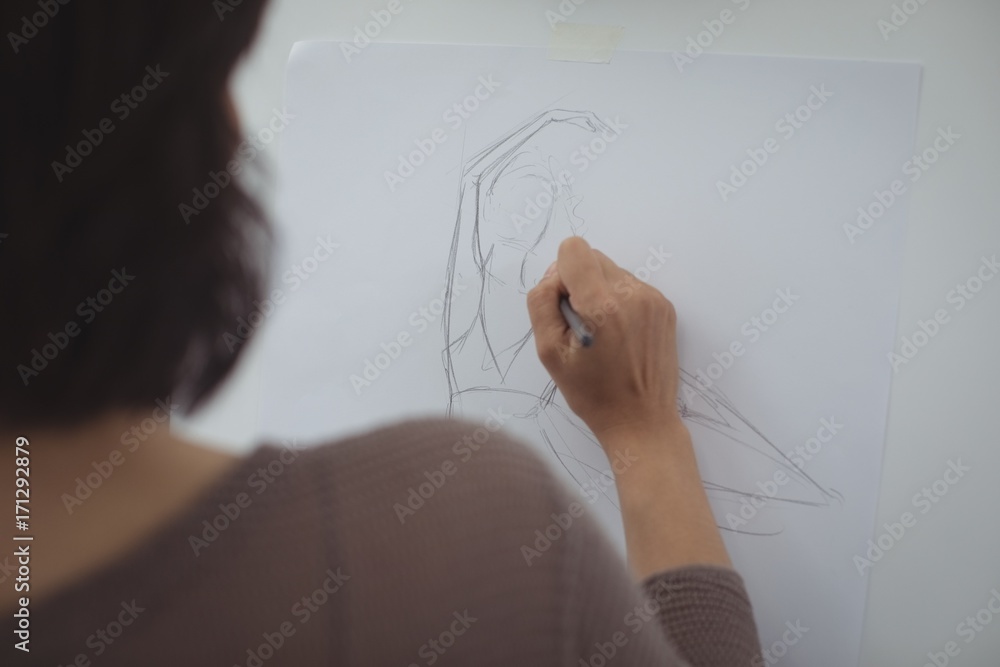 Artist drawing sketch on canvas Stock Photo | Adobe Stock