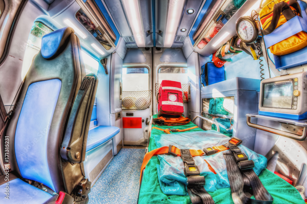 Inside the ambulance, view from the sanitary compartment. Different ...