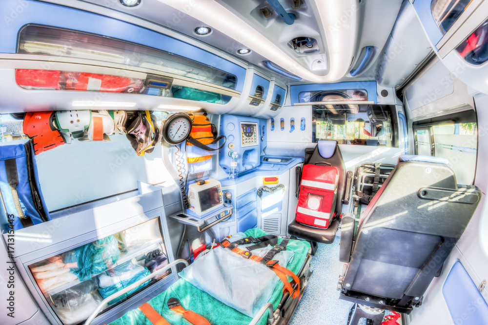 Inside the ambulance, view from the sanitary compartment. Different ...