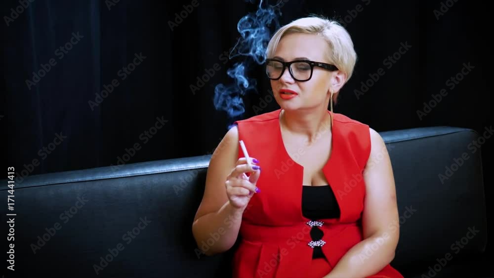 Join lovely girl in her smoking video ever where she tries strong ...