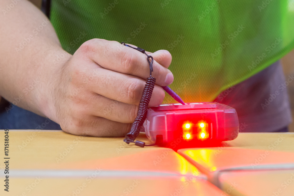 Worker use handheld Stock Photo | Adobe Stock