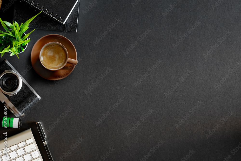 Work space concept : Office dark desk table with computer and supplies ...