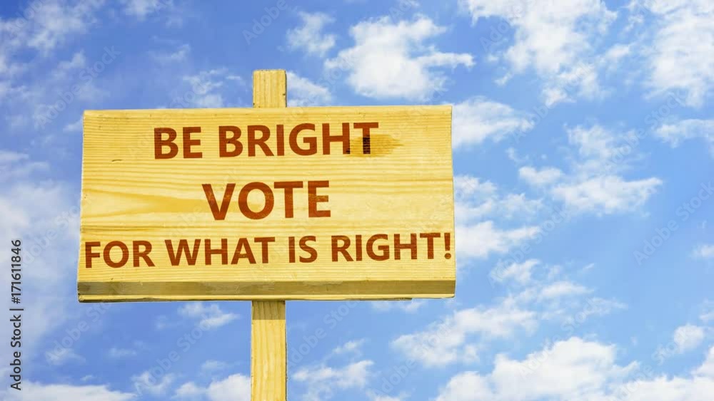 Be bright vote for what is right. Words on a wooden sign against time ...