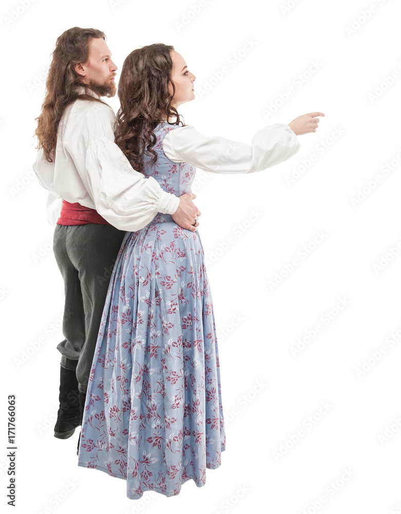 Beautiful couple woman and man in medieval clothes. Back pose Stock ...