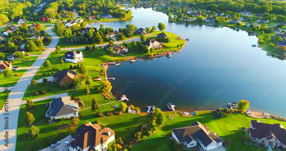Beautiful neighborhoods, homes around lake, aerial view, dawn, aerial ...