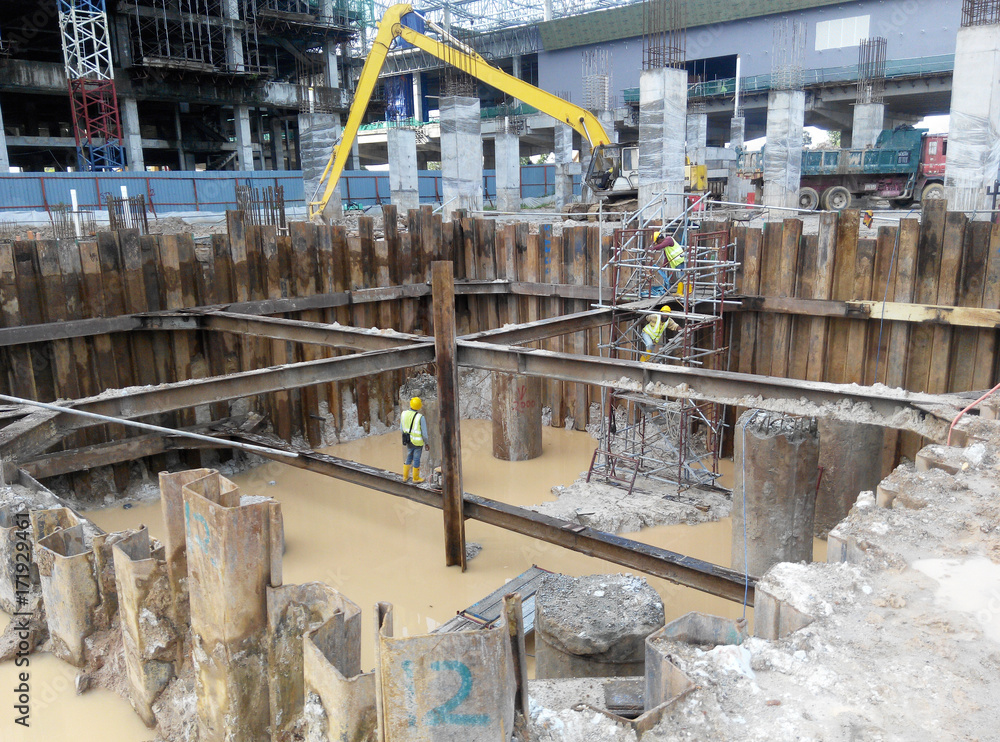 Sheet pile cofferdam retaining wall at the construction site. It is ...